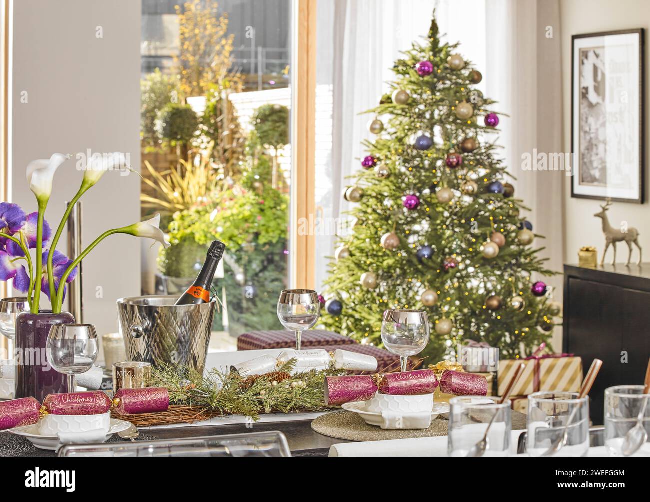 Christmas tree and dining table Stock Photo - Alamy