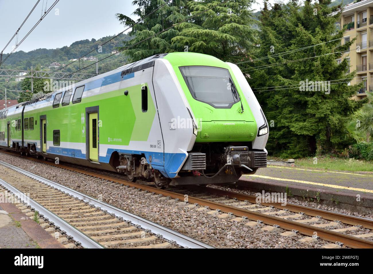 A Trenord class ETR.421 no. 421-034 arrives at Stresa station with a ...