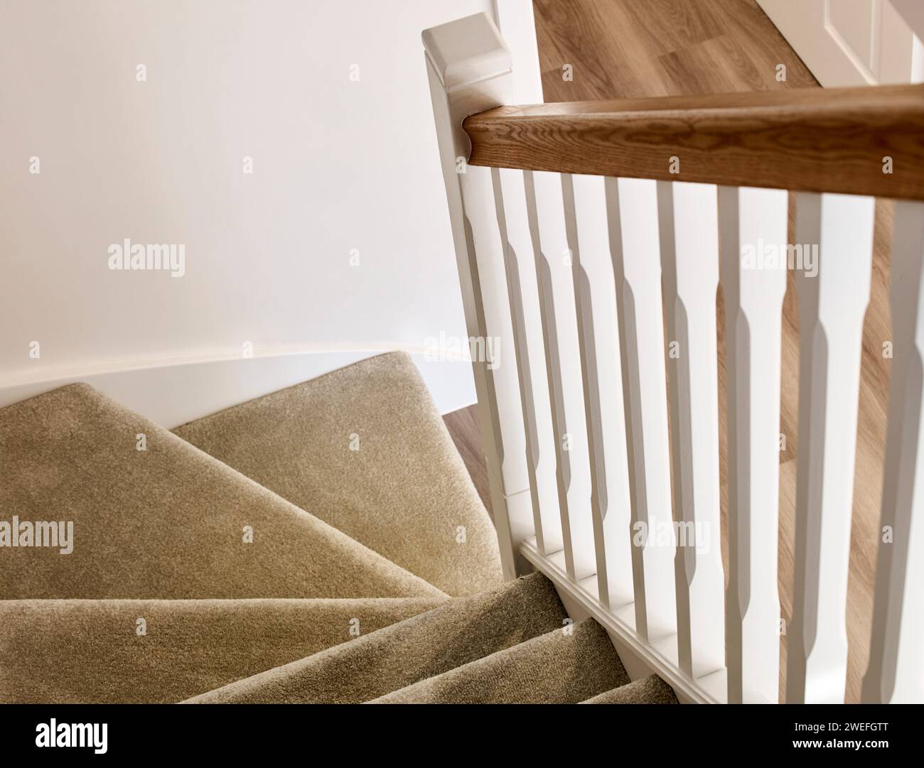 Base of residential staircase Stock Photo - Alamy