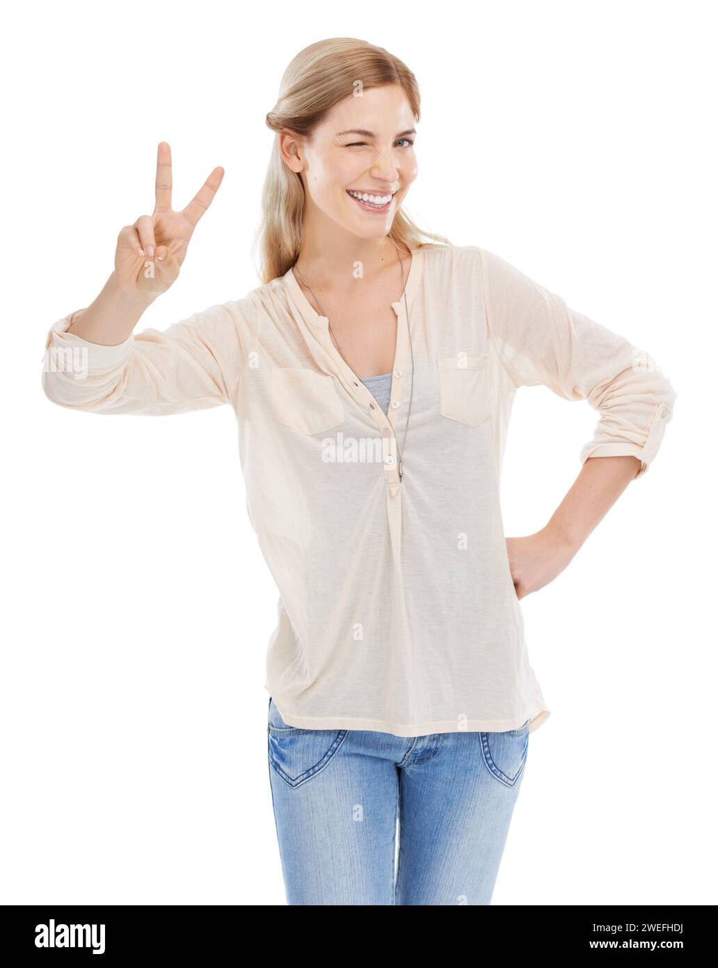 Smile, peace sign and woman wink in portrait at studio isolated on a ...