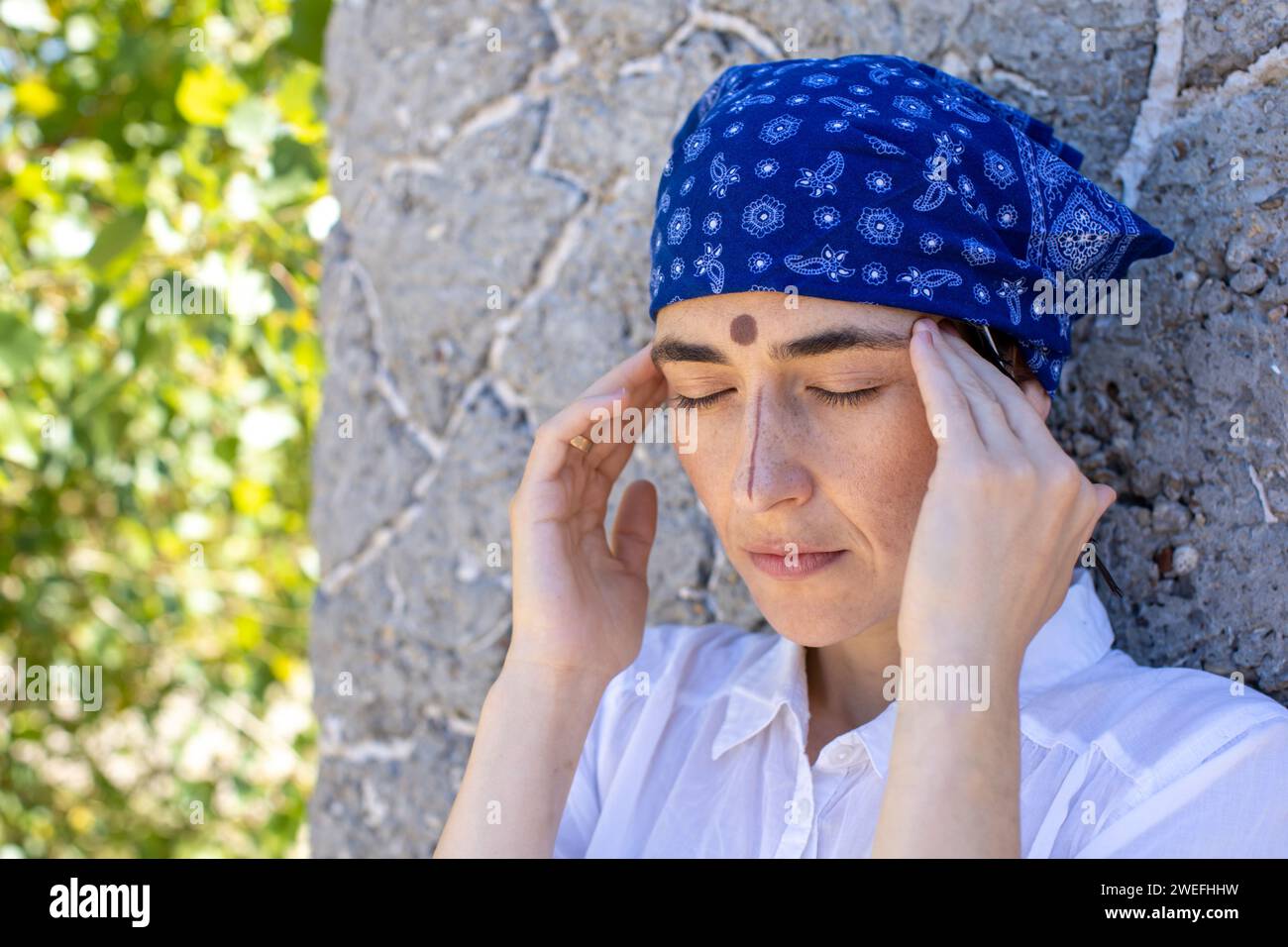 modern female guru sensing spiritual connection Stock Photo - Alamy