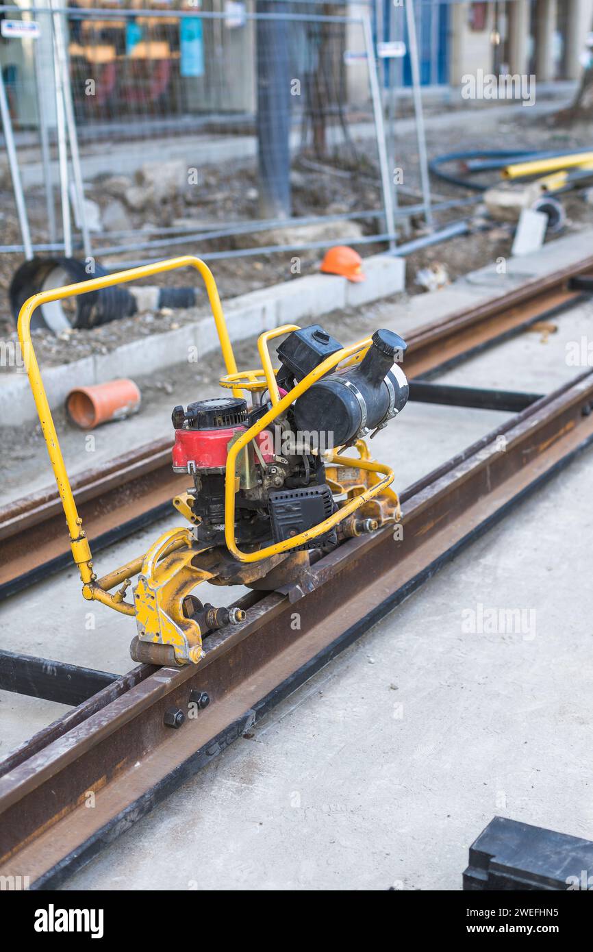tram aligning machine adjusting lines during street renovation Stock ...