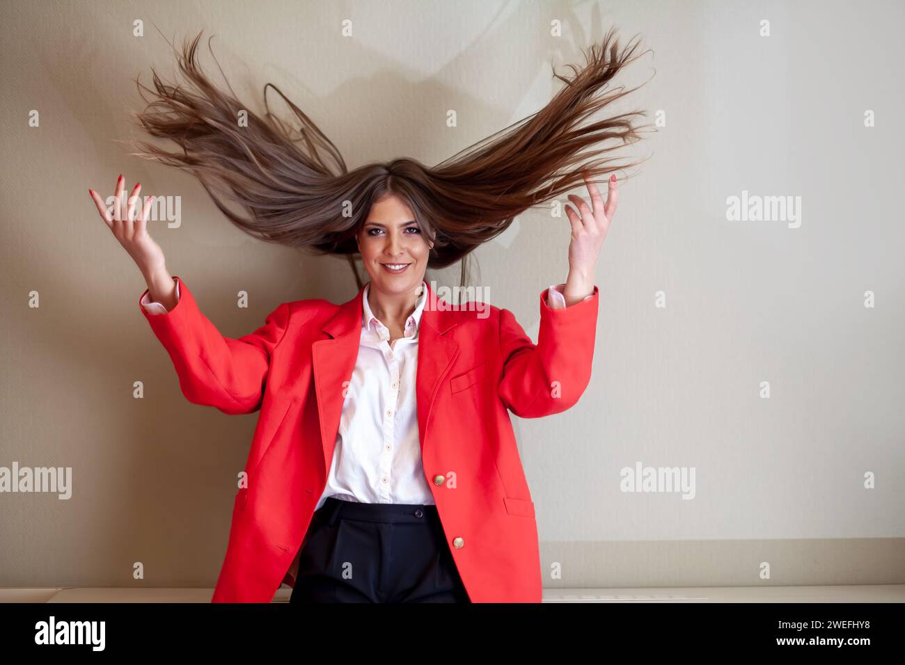 Hair flick hi-res stock photography and images - Alamy
