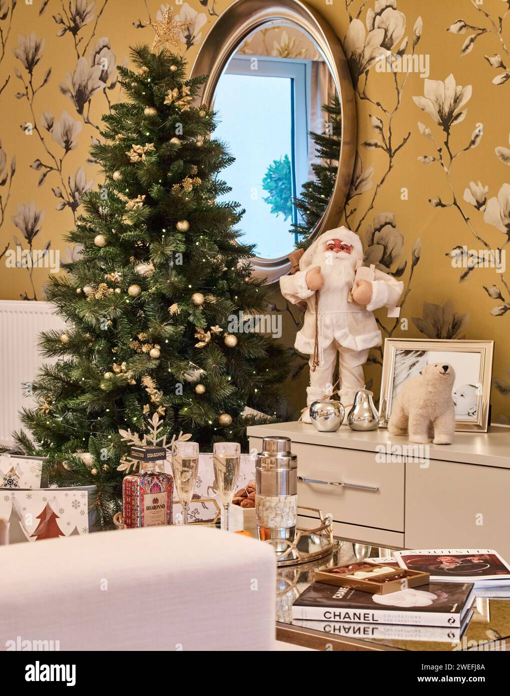 Christmas tree in living room Stock Photo - Alamy