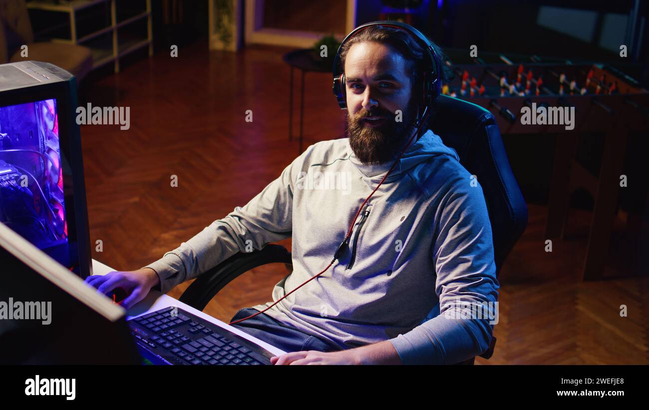 Gamer discussing with audience multiplayer video game match winning ...