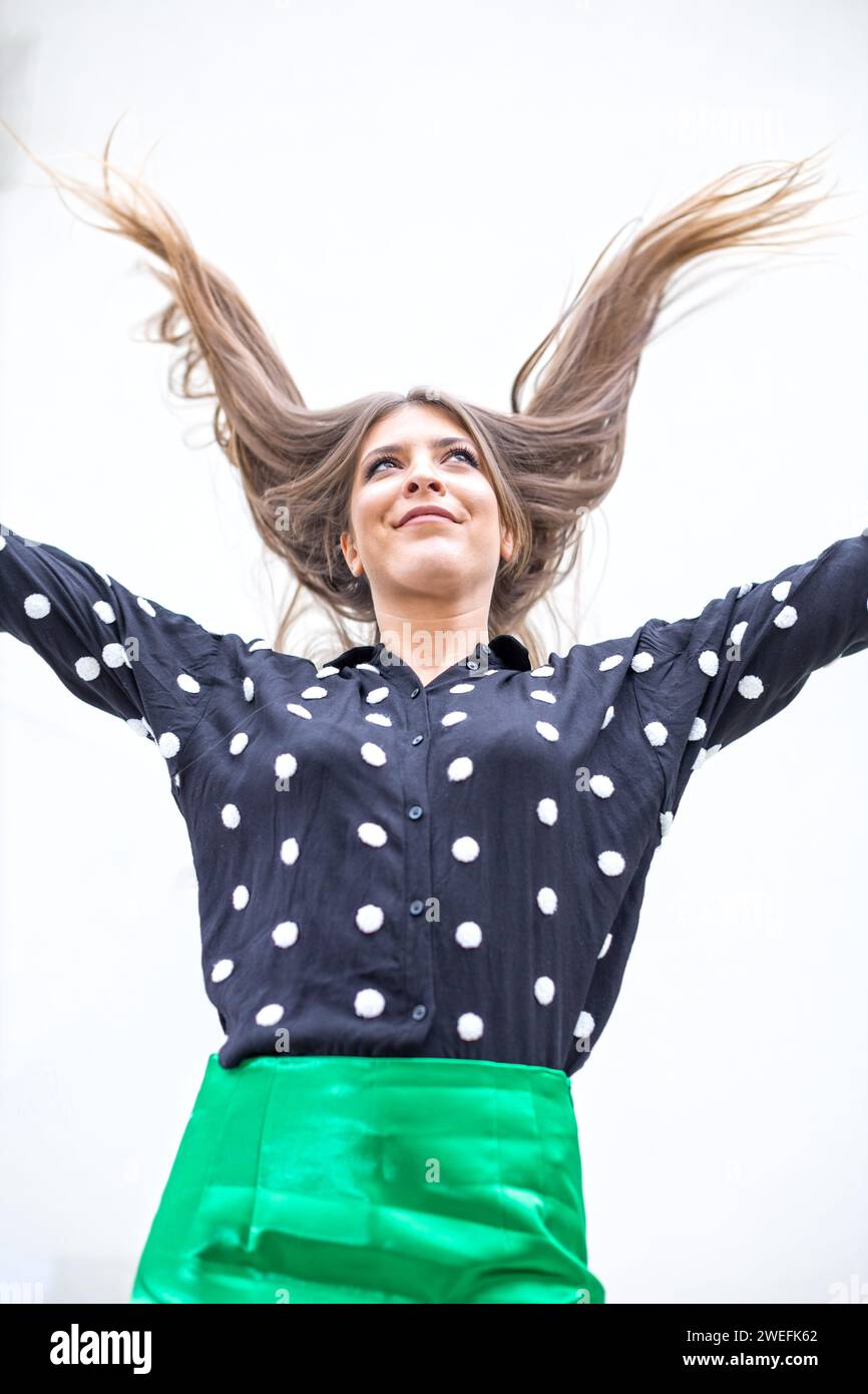 Hair flick hi-res stock photography and images - Alamy