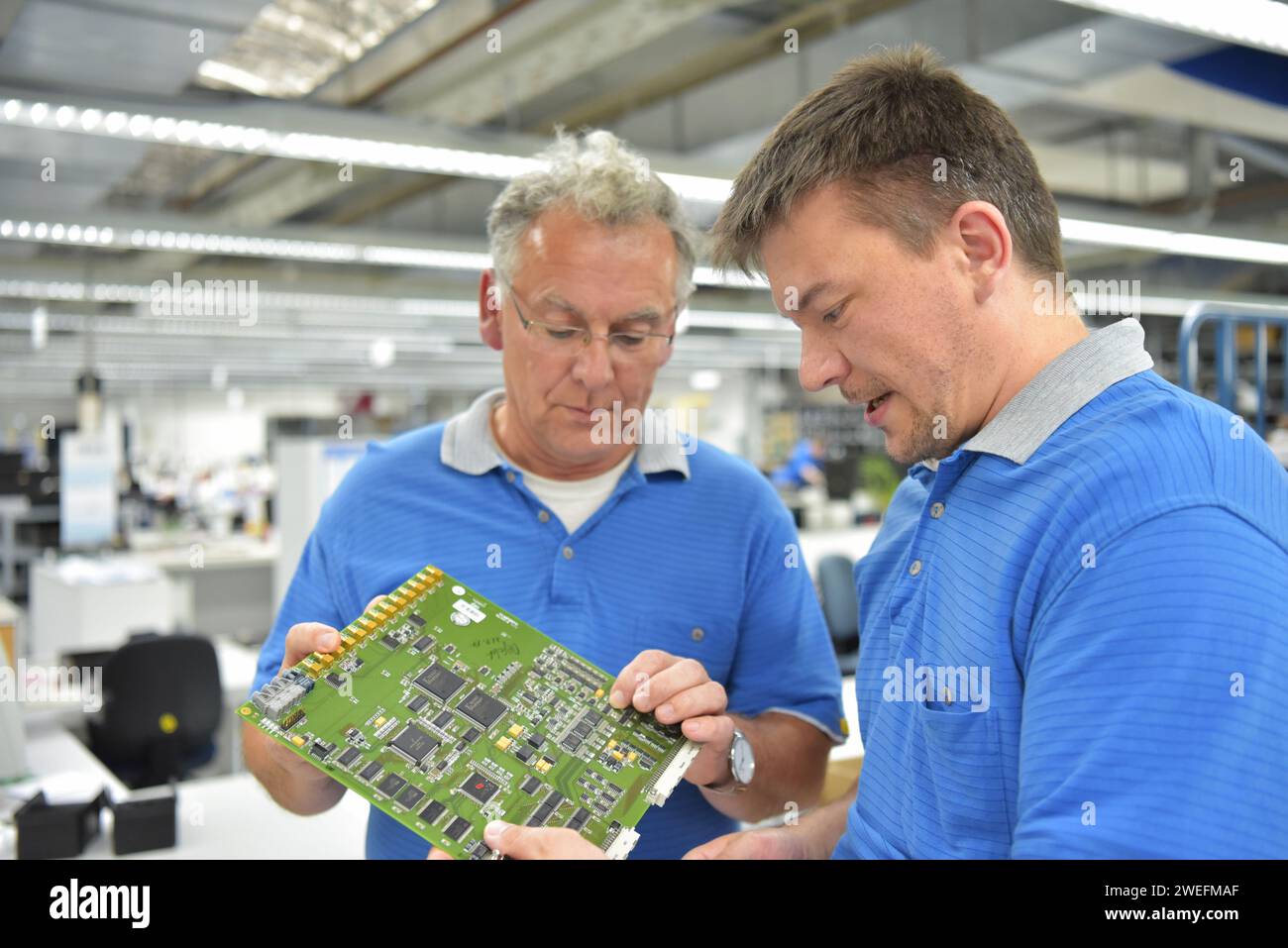 working in a microelectronics manufacturing factory - component ...