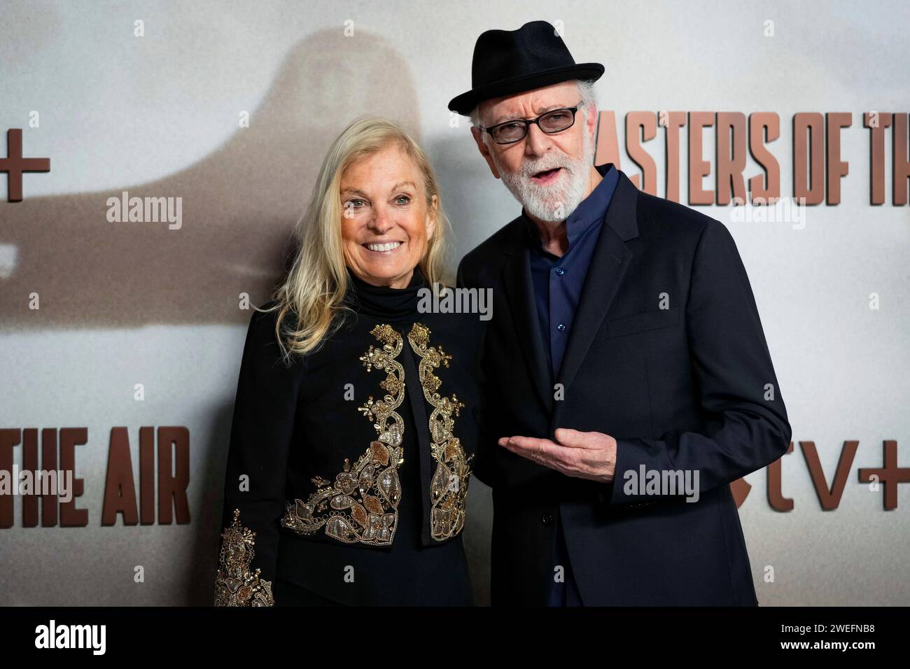 Jane D. Hartley, left, and Gary Goetzman pose for photographers upon ...