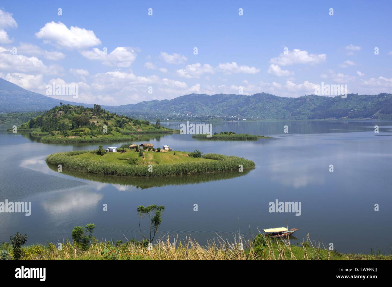 Boat trip in Musanze, Ruhengeri, Rwanda with vivid green islands near ...