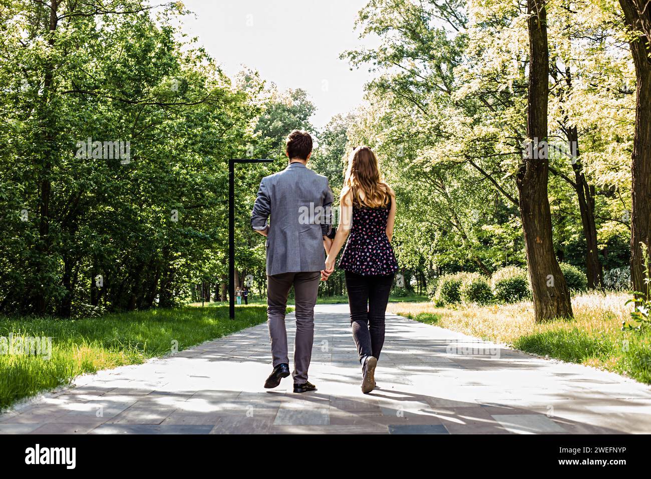 Back view young stylish couple hi-res stock photography and images - Alamy
