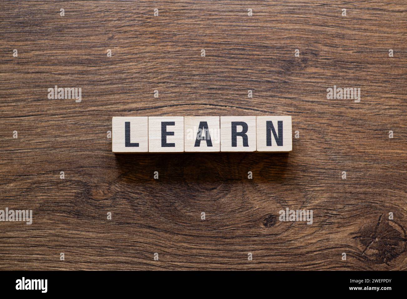 Learn - word concept on building blocks, text Stock Photo - Alamy