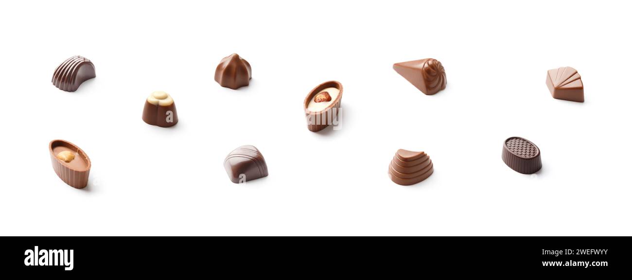 A set of chocolates with different fillings on a white background ...