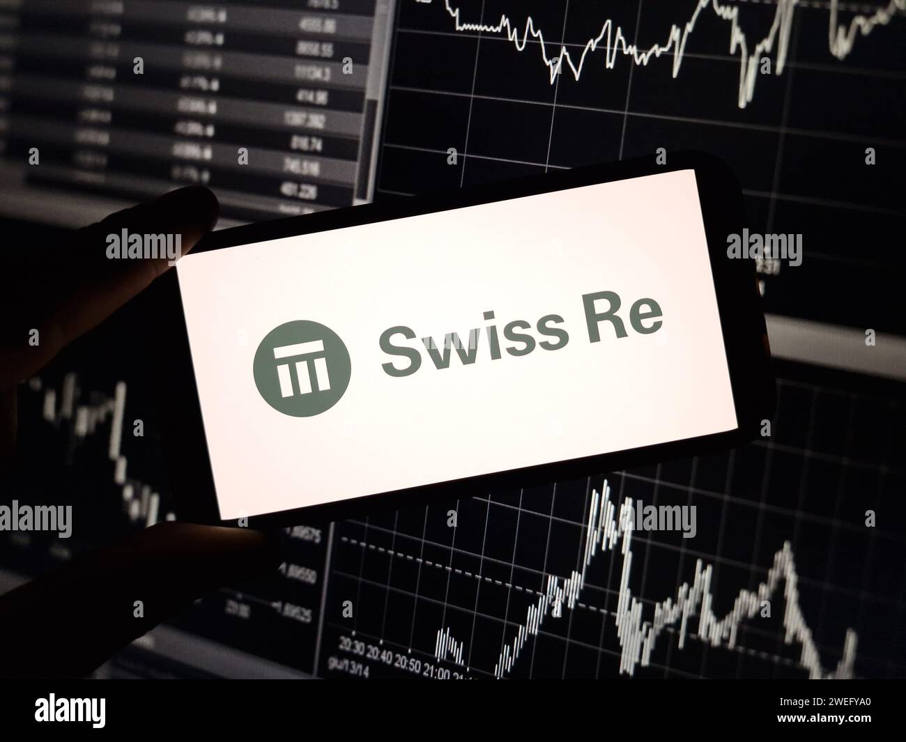 Konskie, Poland - January 24, 2024: Swiss Re company logo displayed on mobile phone screen Stock ...