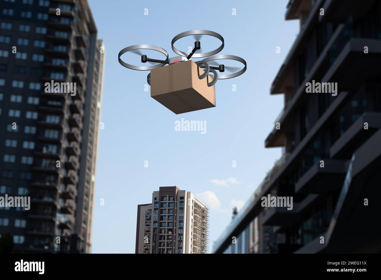 delivery drone carrying a package flying above the city Stock Photo - Alamy