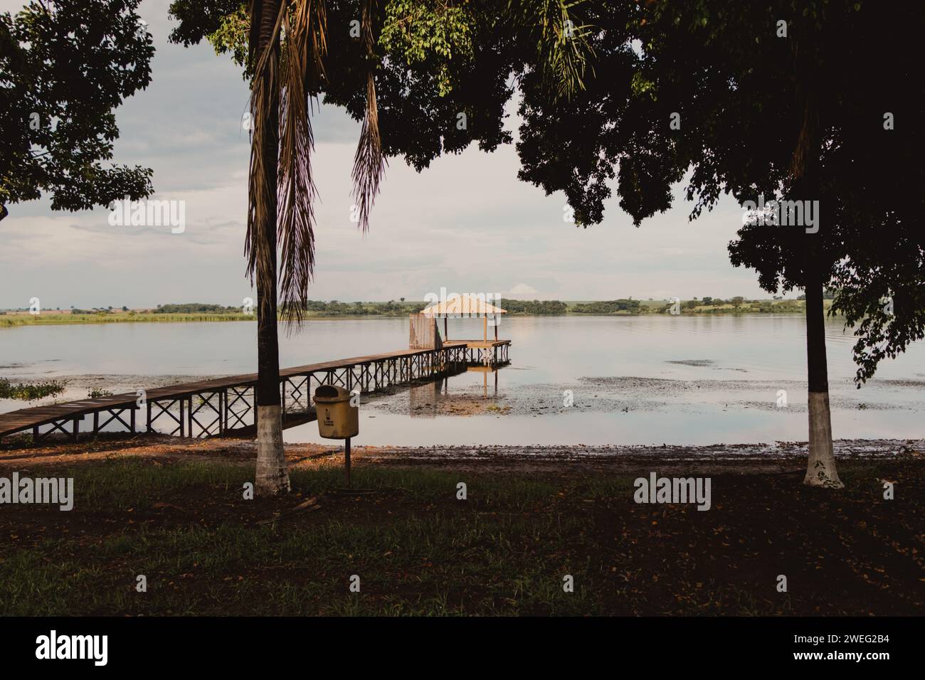 wooden pier in calm lagoon Stock Photo - Alamy