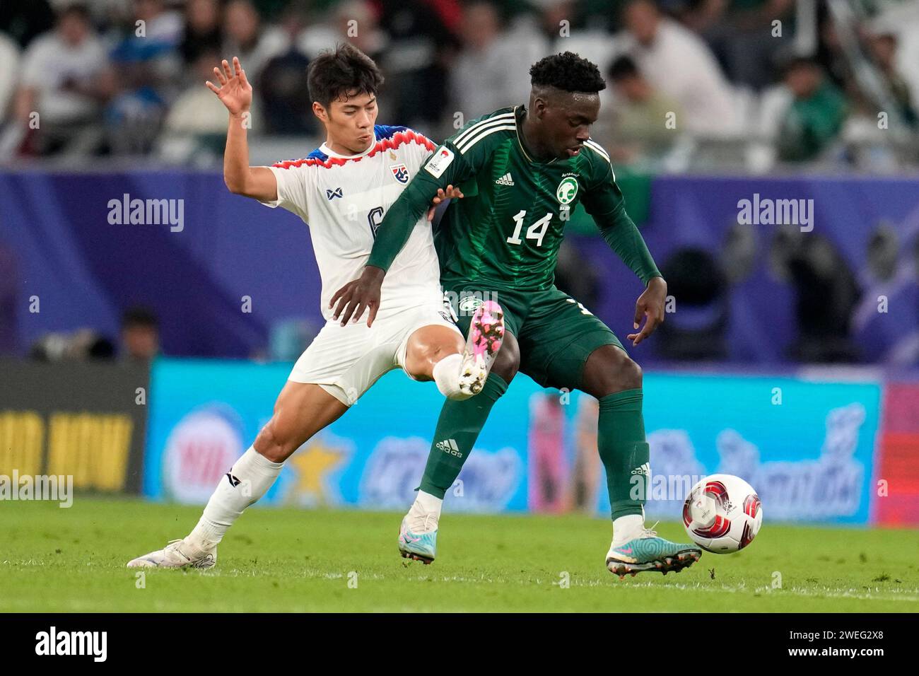 Saudi Arabia's Abbas Alhassan, right, and Thailand's Sarach Yooyen ...
