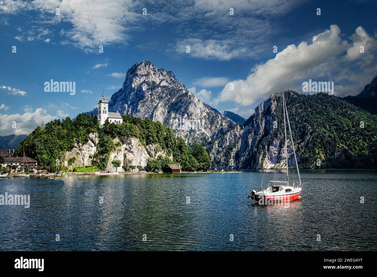 Traunkirchen sits on a high rock above Traunsee in the Salzkammergut of ...