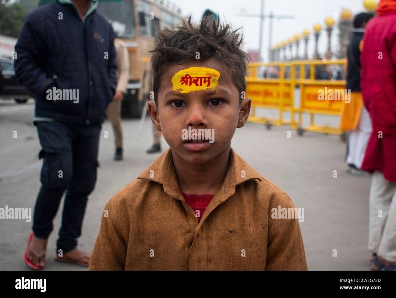 Children get painted the name of Lord Ram on their forehead, on the eve ...