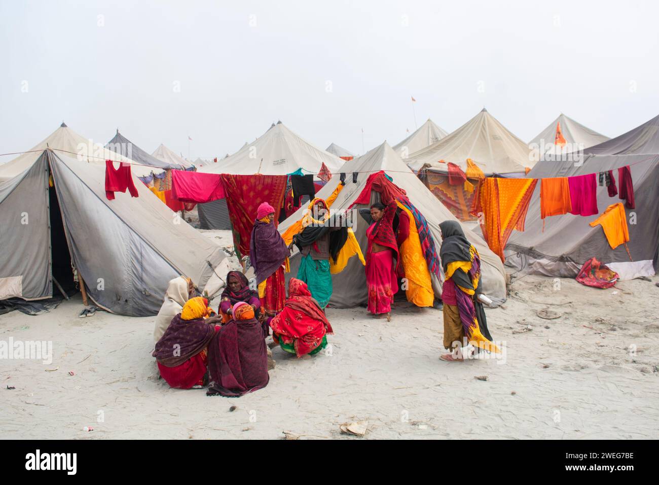 Devotees staying in tents, as they arrives to see, consecration ceremony of the Ram temple, in ...