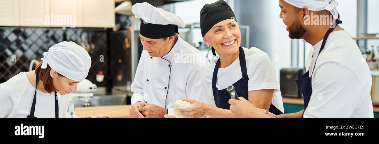 joyous chef smiling at her african american colleague with friend and ...