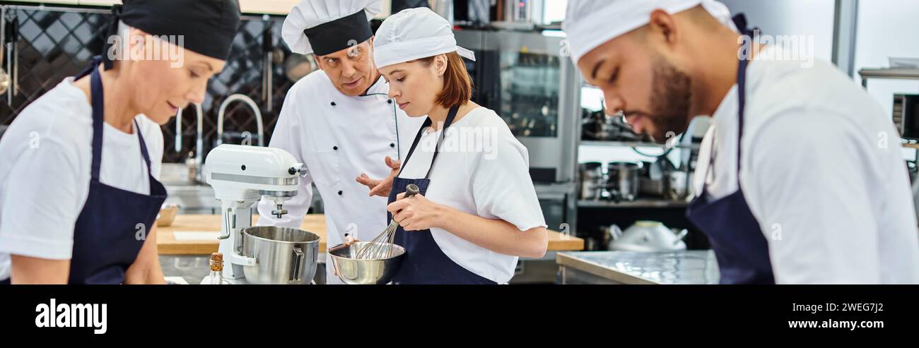 mature chief cook in white hat talking to his hard working interracial ...