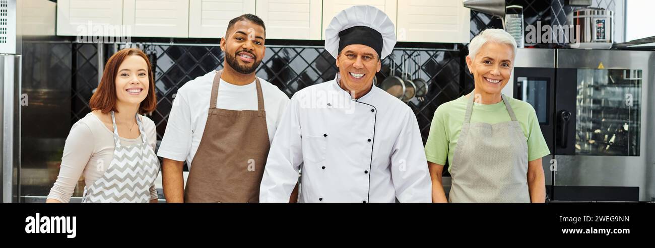 cheerful multicultural students posing next to mature chef during ...