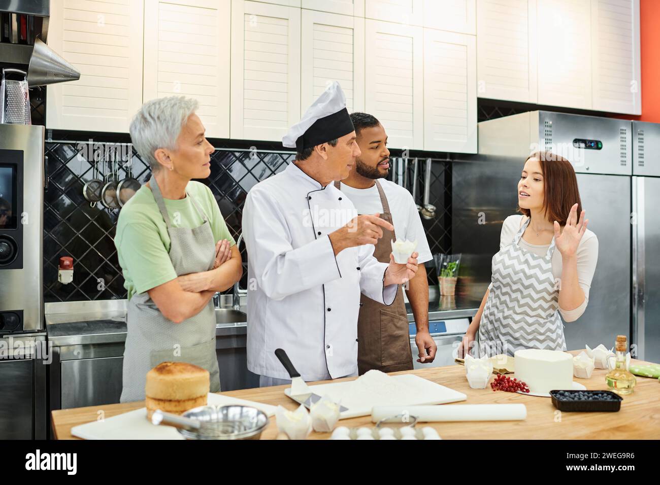 Young woman pastry chef cupcakes hi-res stock photography and images ...