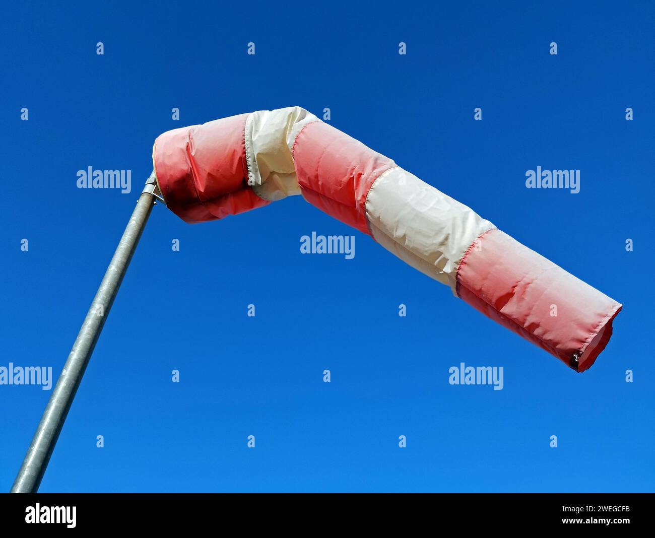 Windsock to visualize the force and direction of the wind Stock Photo ...