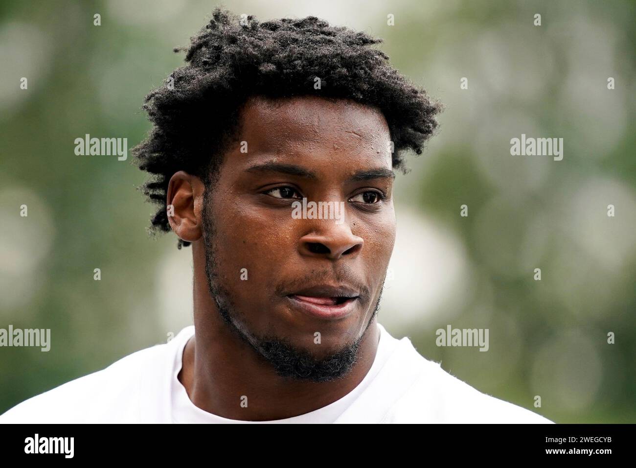 FILE - Seattle Seahawks cornerback Devon Witherspoon walks off the ...