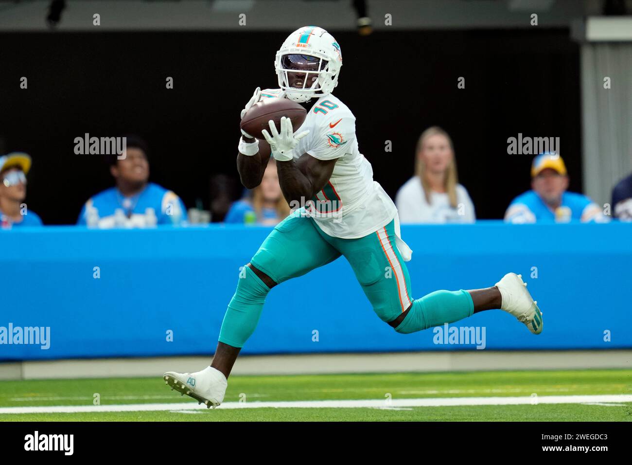 FILE - Miami Dolphins wide receiver Tyreek Hill catches a touchdown during the second half of an ...