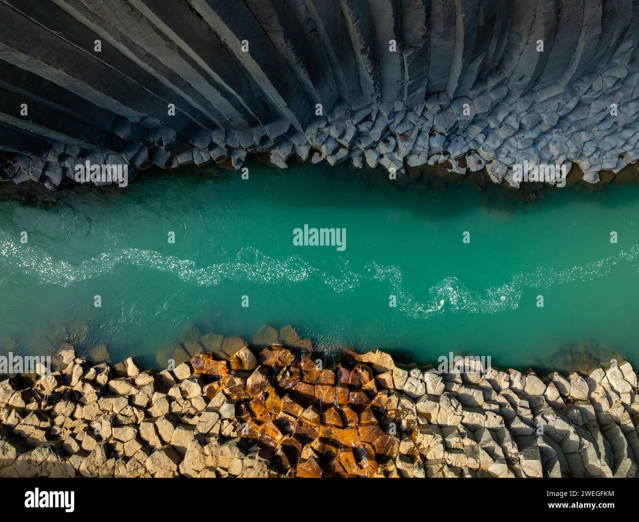 Majestic turquoise river running through unique white rock formations ...