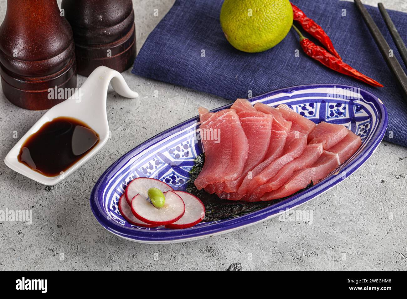 Japanese cuisine - sliced raw tuna sashimi Stock Photo - Alamy