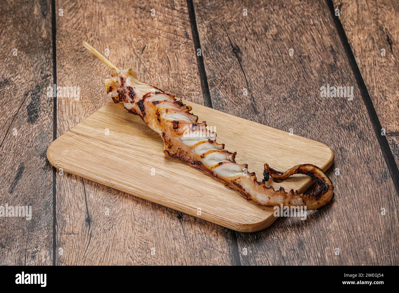 Delicous tasty Grilled octopus tentacle snack Stock Photo - Alamy