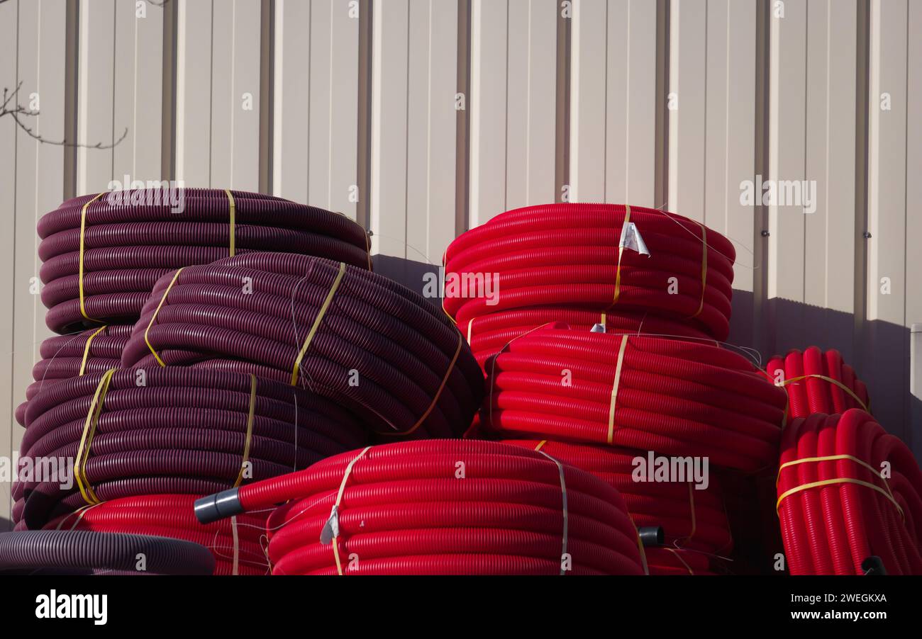 red corrugated wires for covering pipes and cables Stock Photo - Alamy