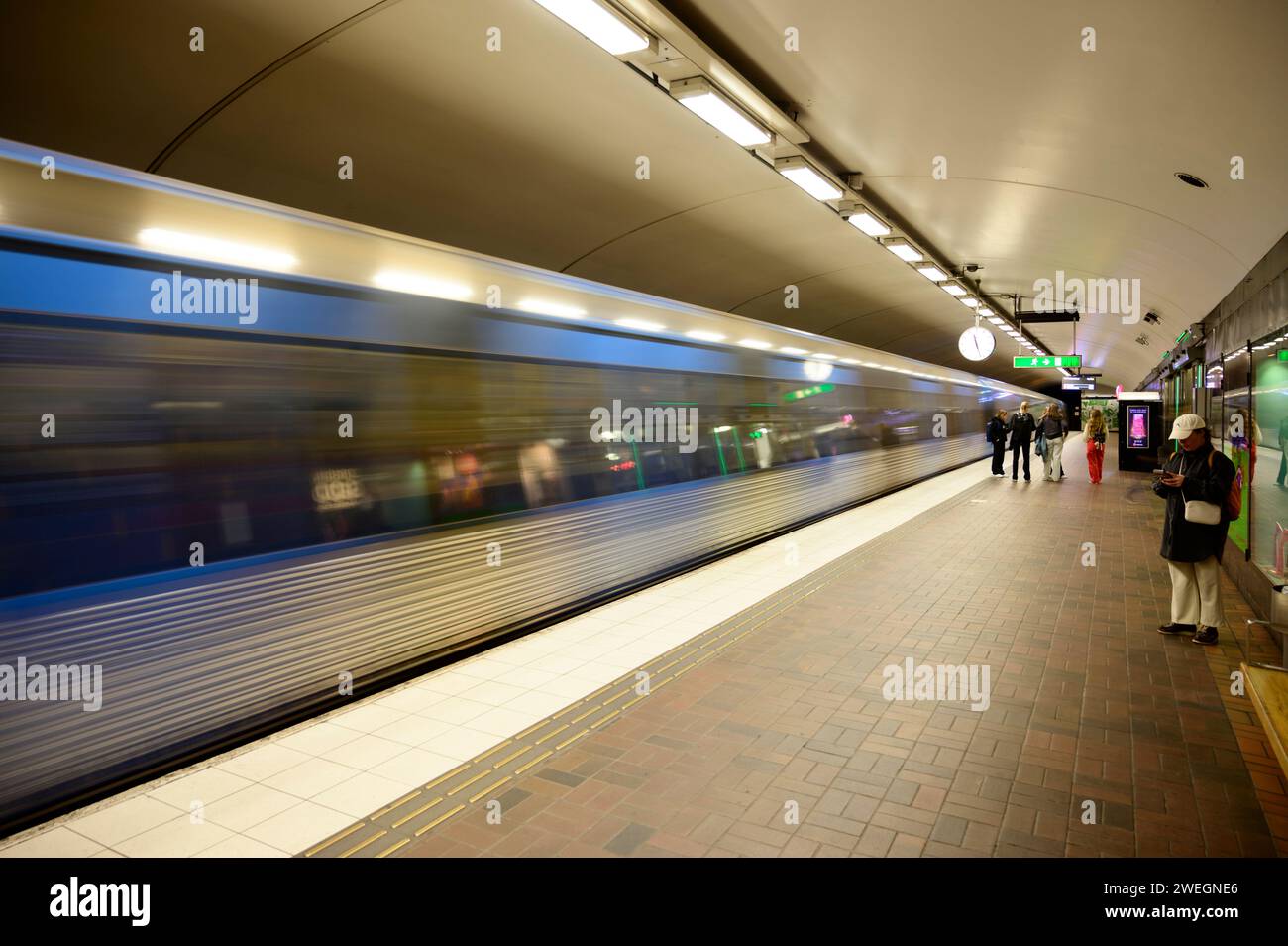 Moving train along a platform in a Stockholm metro station Stock Photo ...