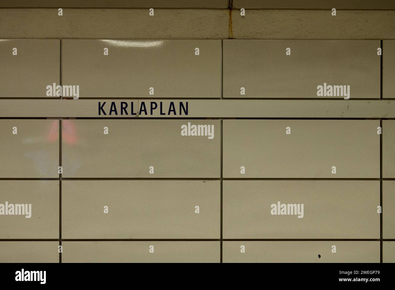 Tiles with text in Stckholm metro station Karlaplan Stock Photo - Alamy