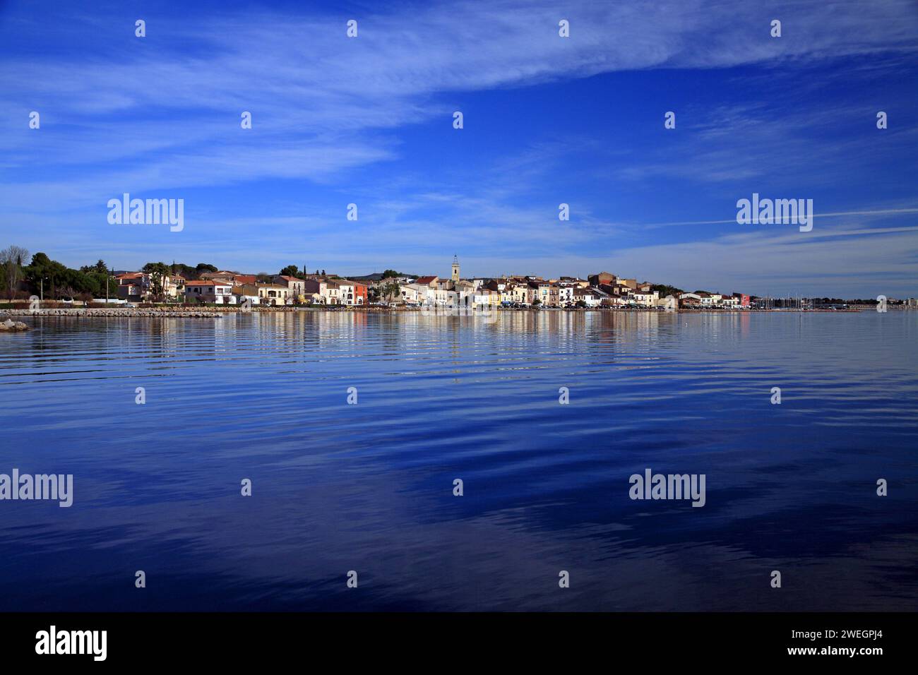 The village of Bouzigues on the banks of the Etang de Thau. Occitanie ...