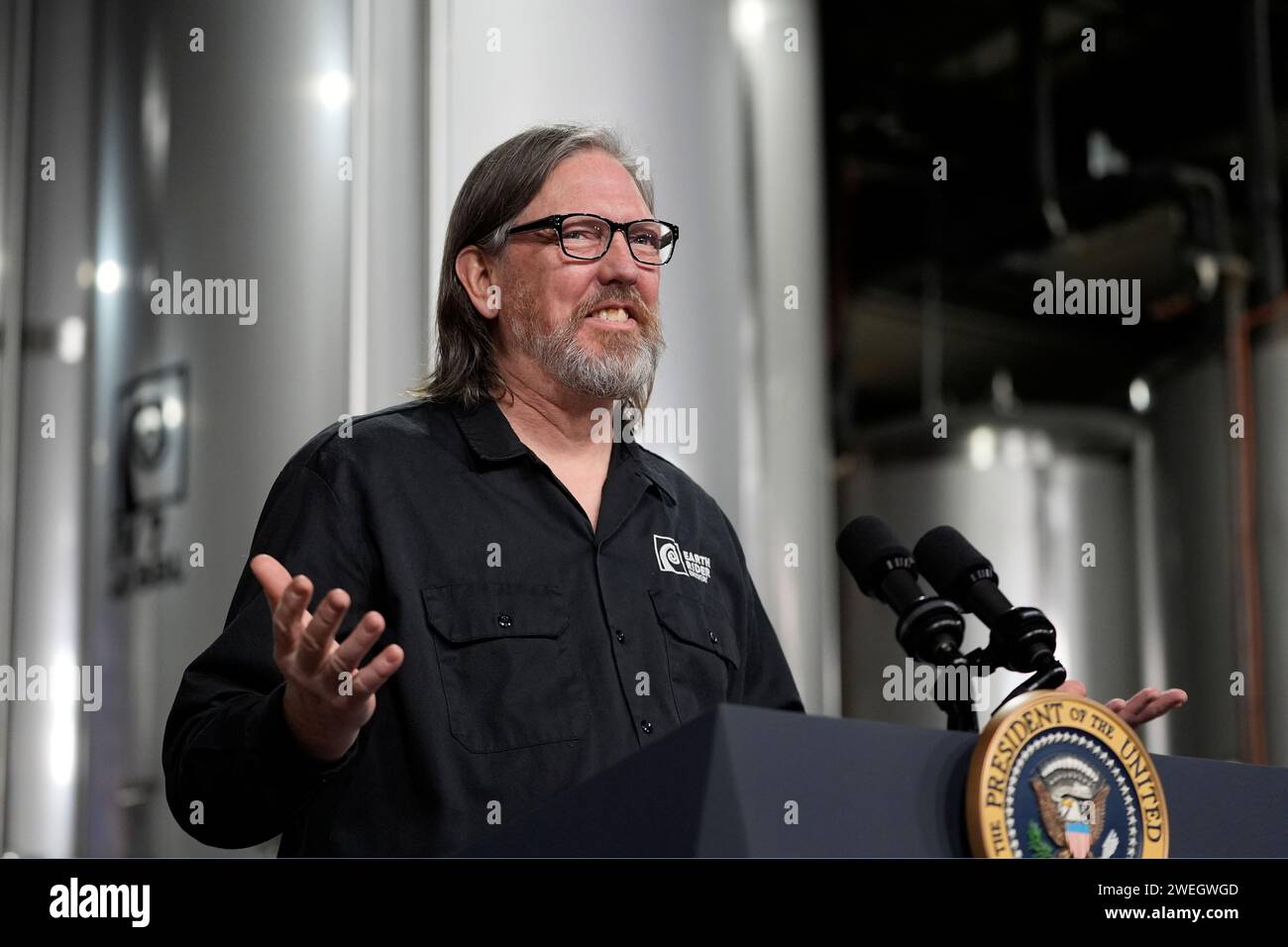 Brewery owner Tim Nelson speaks before President Joe Biden at the Earth ...