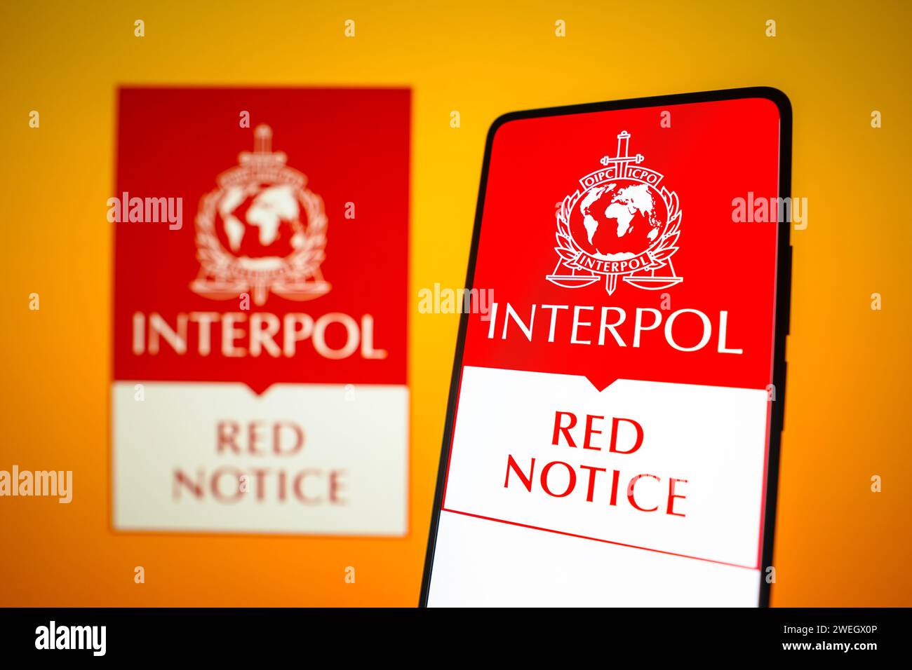 In this photo illustration, the Interpol Red Notice logo is displayed ...