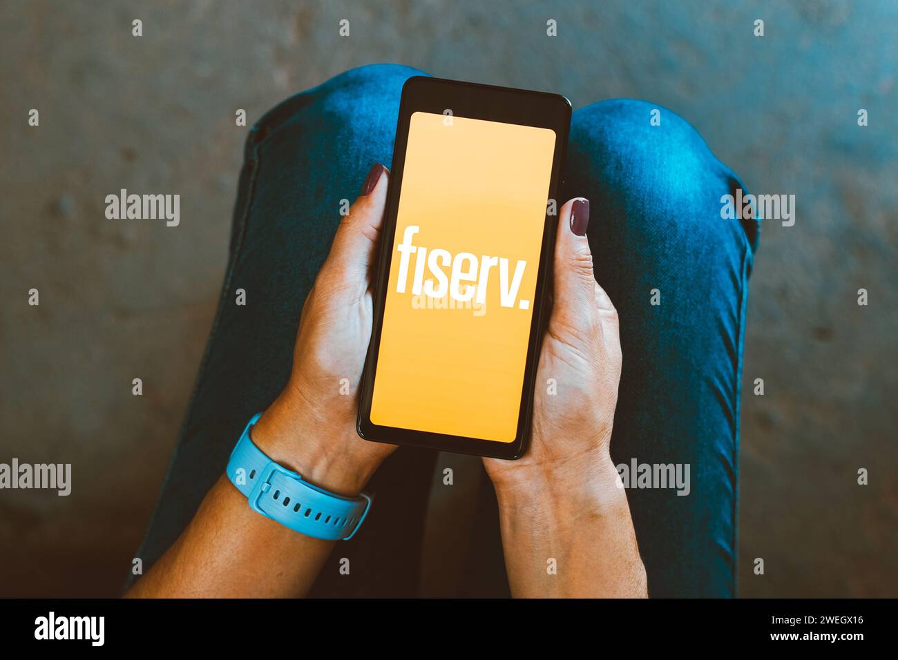 In this photo illustration, the Fiserv, Inc. logo is displayed on a ...