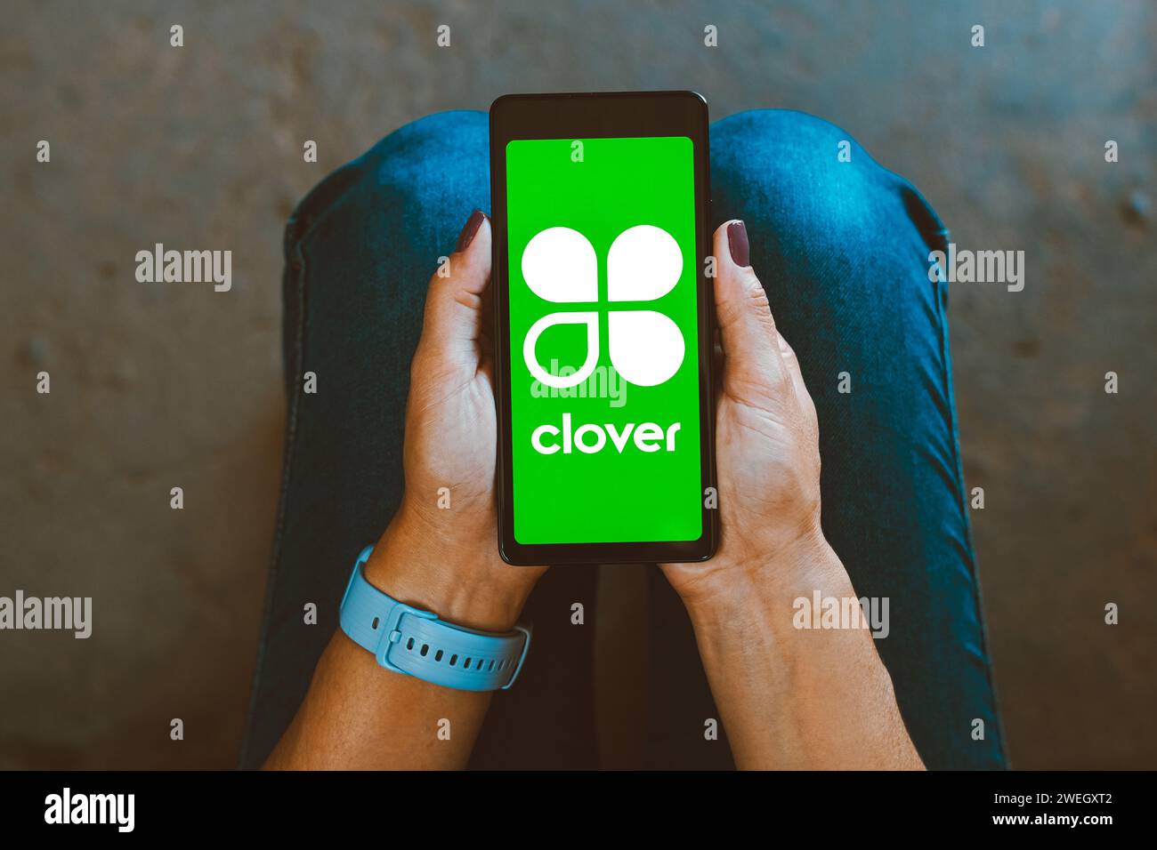 In this photo illustration, the Clover Network logo is displayed on a ...