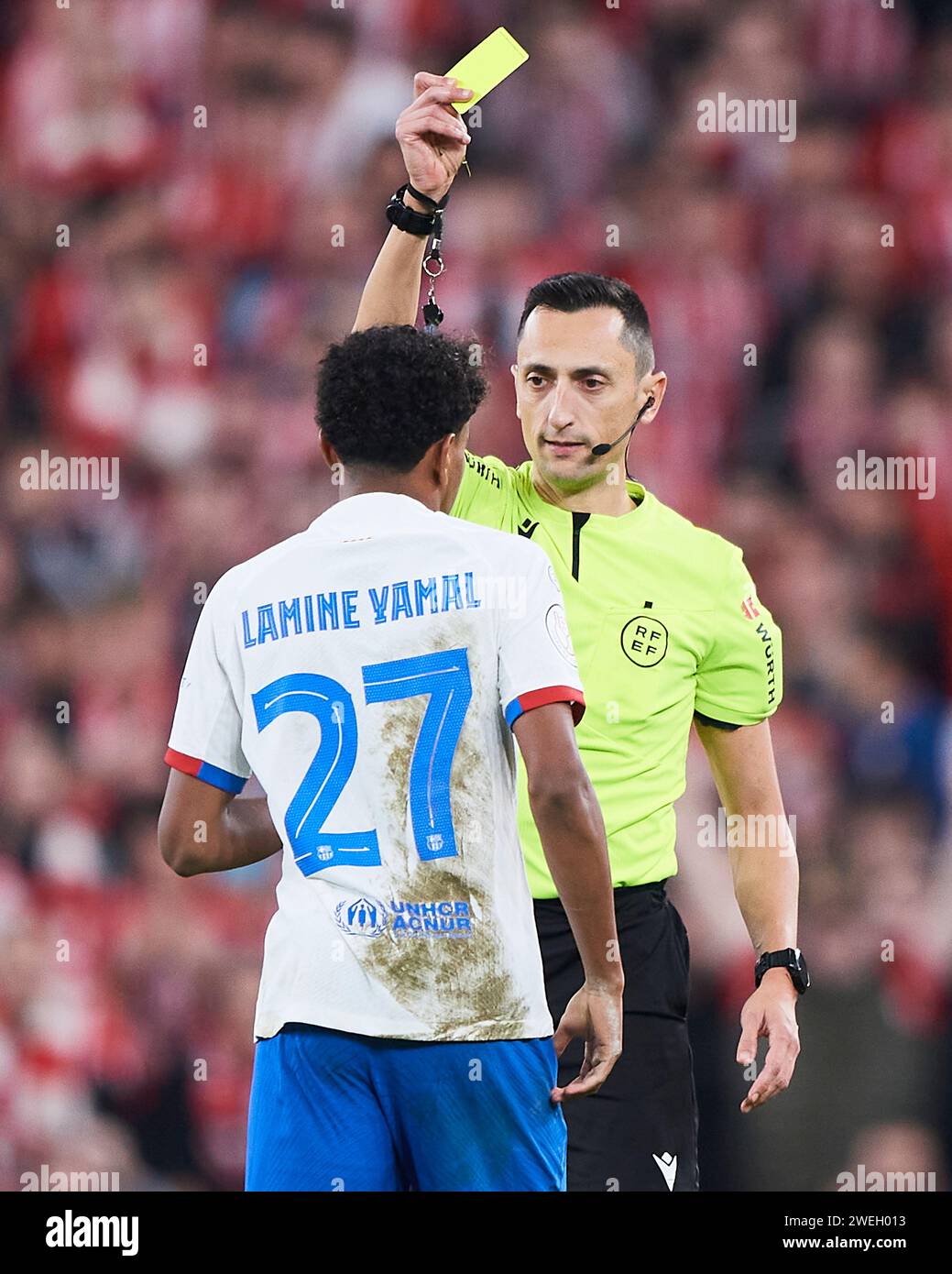 Yamine Lamal of FC Barcelona is shown a yellow card by referee Jose ...