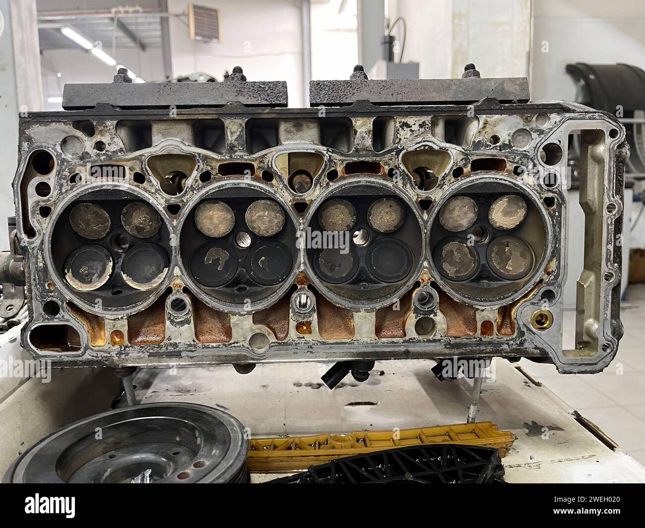 Disassembled engine with heavy dirt and soot on the valves Stock Photo ...