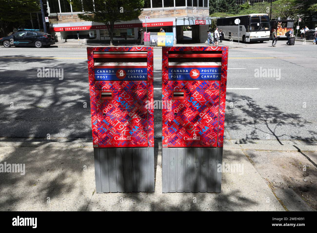 Red mail boxes on a street corner in Vancouver, BC, Canada Stock Photo ...
