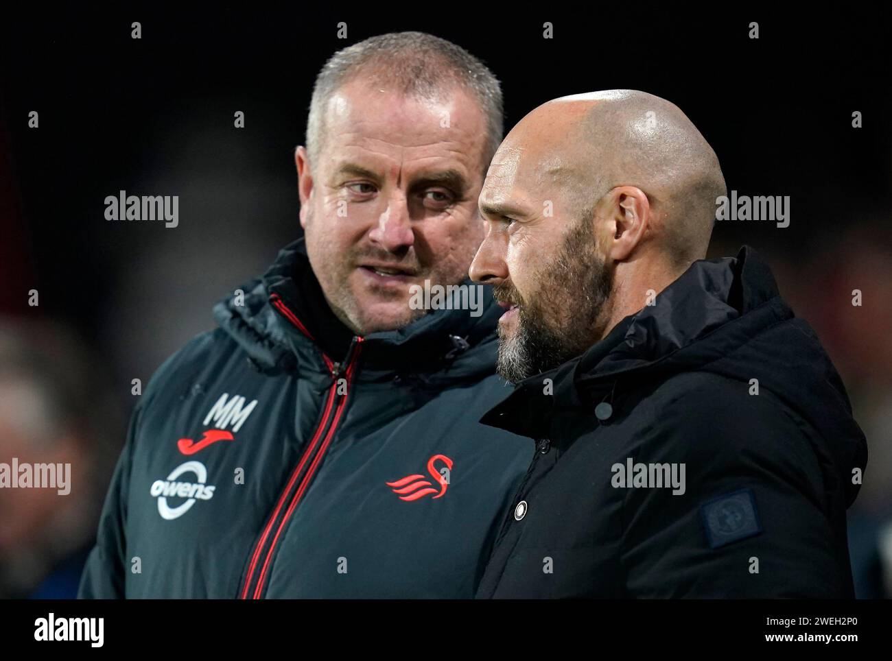 Swansea City manager Luke Williams (right) and head of goalkeeping ...