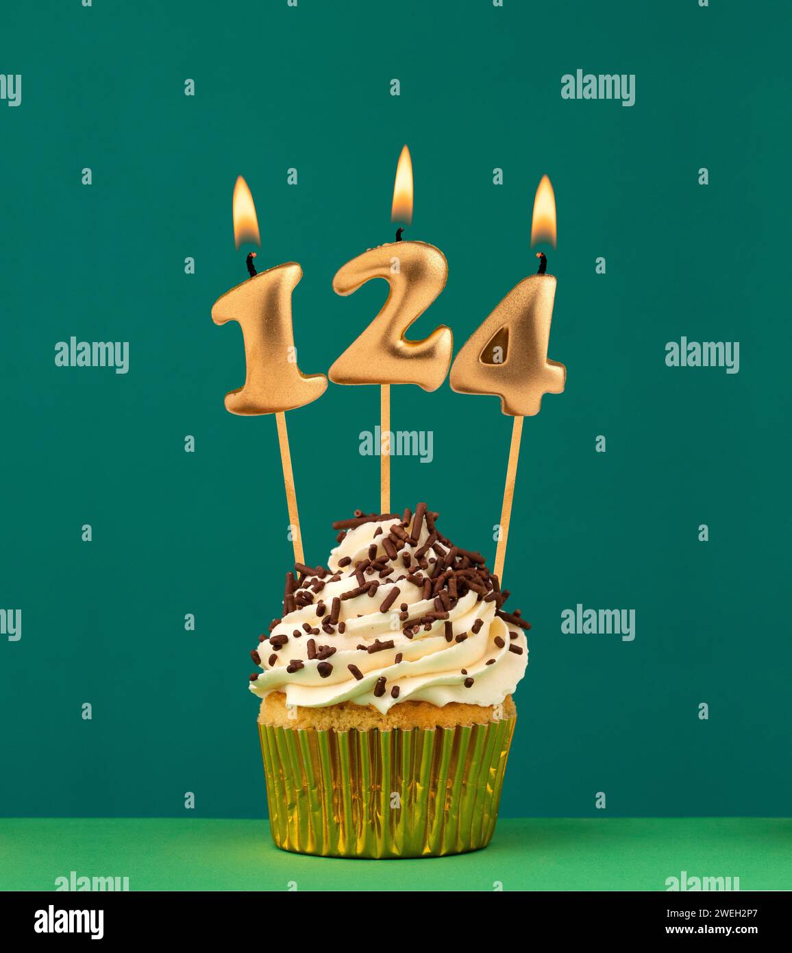 Birthday card with candle number 124 - Green background Stock Photo - Alamy