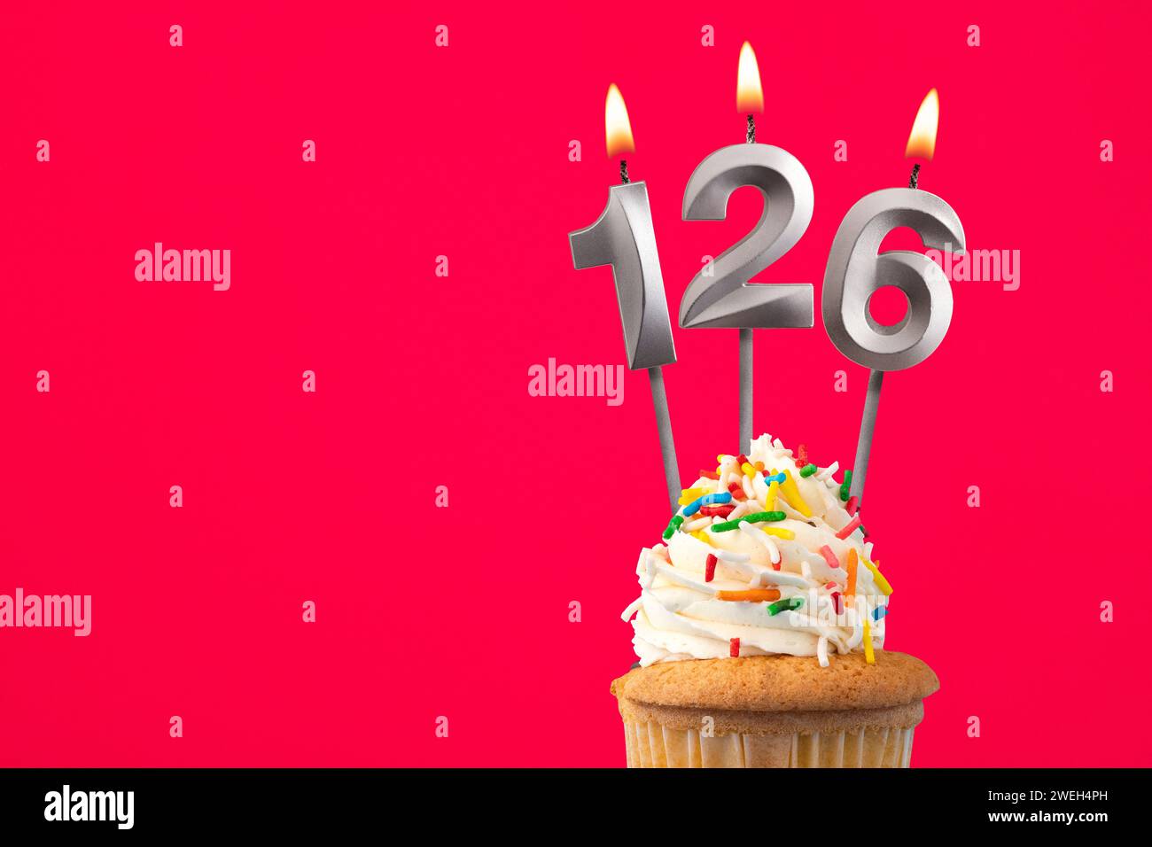 Burning candle number 126 - Birthday card with cupcake Stock Photo - Alamy