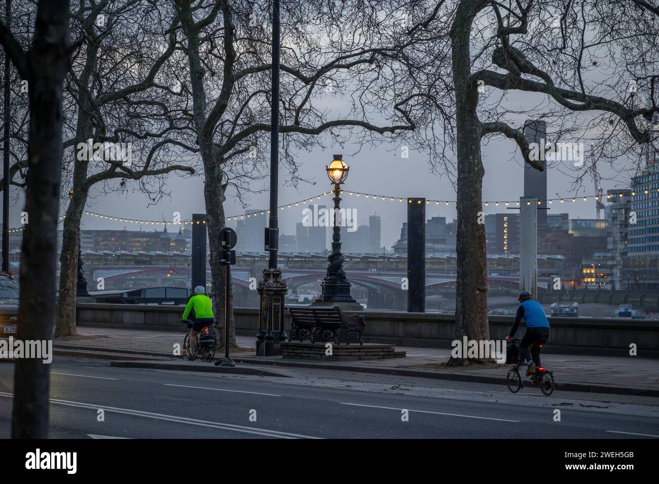Early morning cyclists commute into the City along the cycle lane on ...