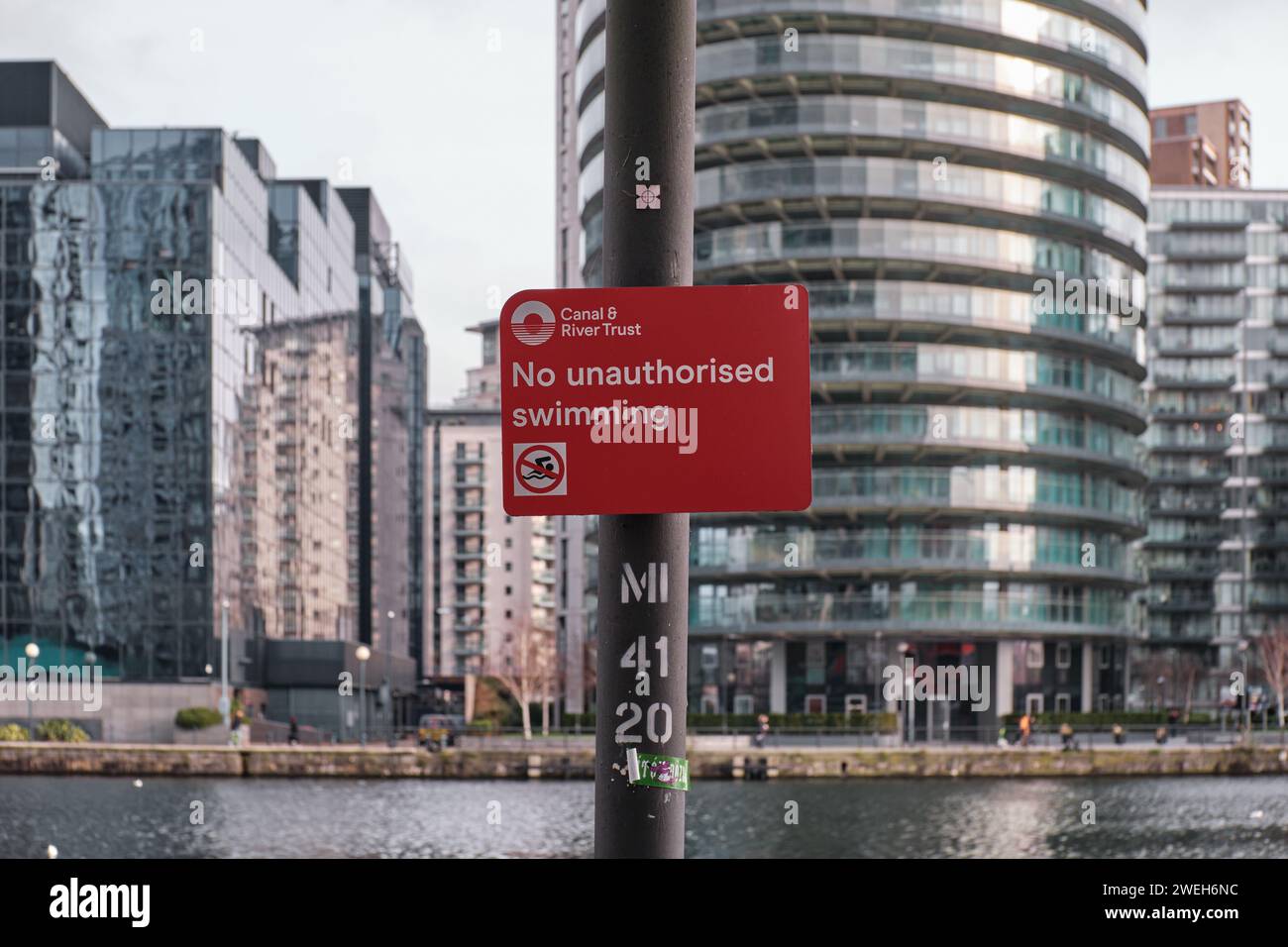 No unauthorised swimming sign, Arena Tower in the background, Millwall ...