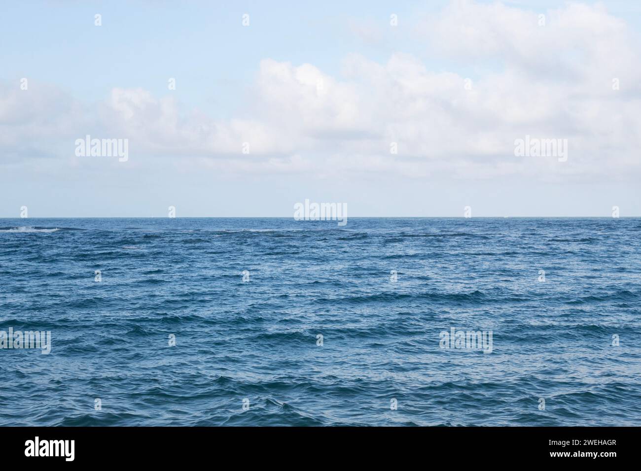 Beautiful deep blue atlantic ocean texture landscape with blue cloudy ...